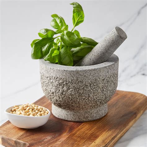 Mortar And Pestle With Herbs