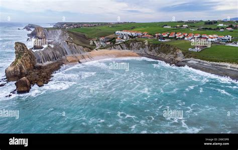 Aerial View Of Portio Beach The Coastline With Sharp Cliffs And Rock