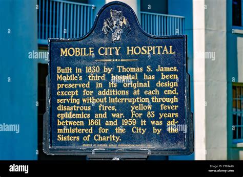 A Historic Marker Stands In Front Of Mobile City Hospital Also Known