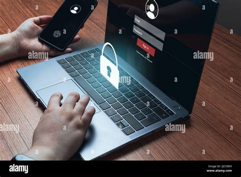 Young Woman Logging In Personal User Information With Laptop And