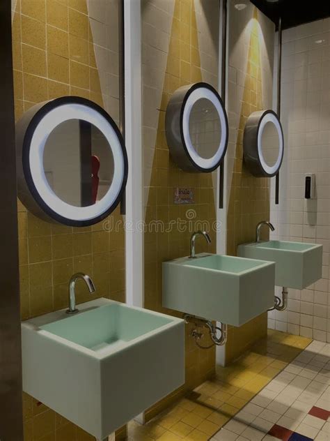 Modern Public Restroom With Artistic Mirrors Stock Image Image Of