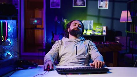 Lazy Man Binging Videogames At Home All Day Feeling Lifeless And