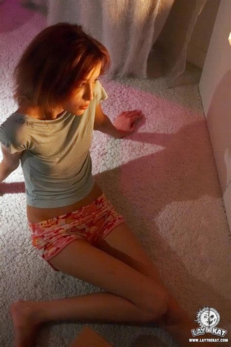 Seductive Young Redhead Posing In A Dimmed Intimate Light Porn Pictures Xxx Photos Sex Images
