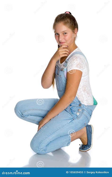 A Teenage Girl Is Sitting On The Floor Stock Image Image Of Cheerful