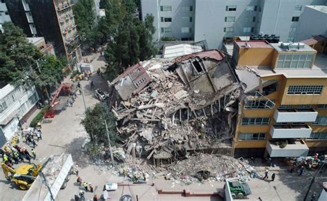 Desperate Rescuers Dig Through Rubble After Powerful Mexico Earthquake