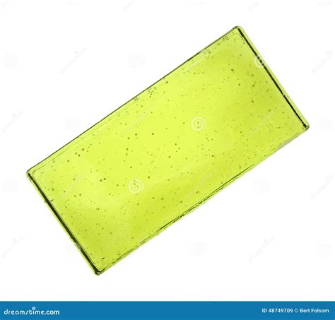 Translucent Glass Of Water With Gases And Bubbles With A Round Slice Of Lemon On A Glass And A