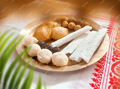 Premium Photo Assamese Traditional Food Items Like Pitha Laddu Doi