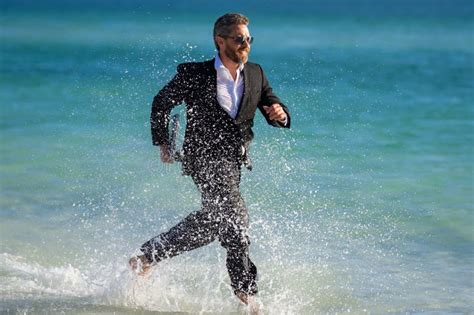 Excited Businessman In Wet Suit Run In Sea Funny Business Man Crazy