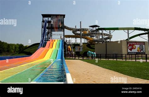 Aqua Park Happy Relaxing On Water Rainbow Slide Stock Video Footage Alamy