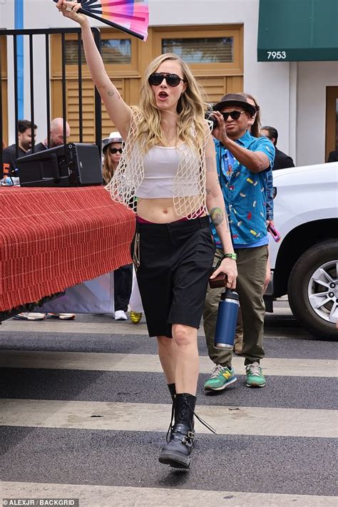 Cara Delevingne Flaunts Her Abs In Crop Top As She Parties With Pals At