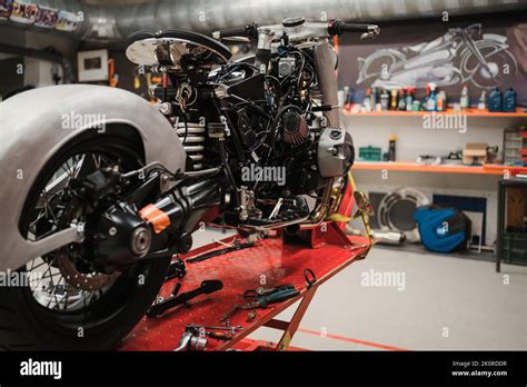 Fixing Custom Motorcycle Standing In Repair Shop Instruments And