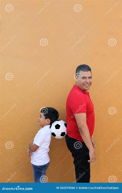 Latino Dad And Son Share Their Love For Soccer They Take A Ball With