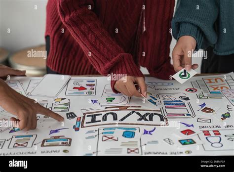 Creative Designer Choosing Color Samples For Mobile Responsive Website Development With UI UX