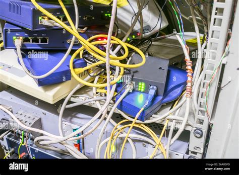 Server Cabinet With Network Internet Equipment Chaotic Interlacing Of Wires Between Modems