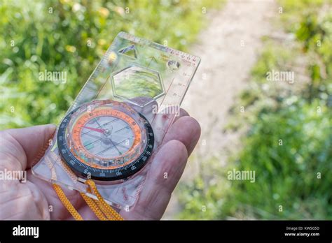 Orienteering Compass In Hand Pointing Ne For Business Direction