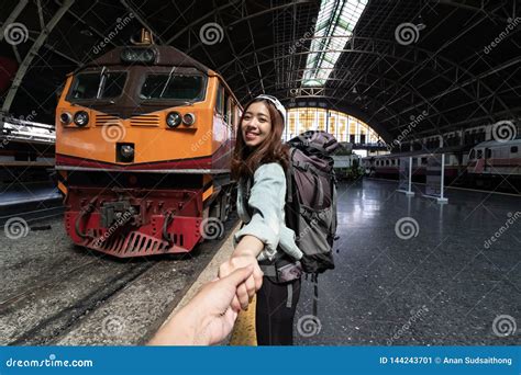 In Love Young Asian Woman Holding Boyfriend Hands Follow Her At Train