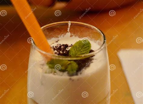 Selective Shot Of Lassi Buttermilk Decorated With Mint Coffee Powder