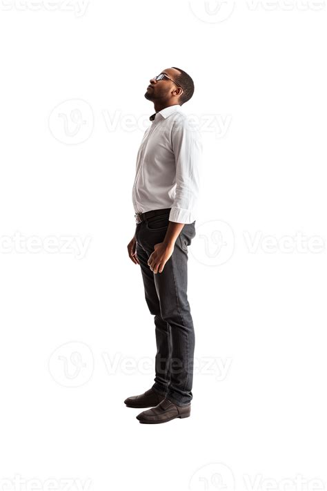 Full Length Portrait Of A Handsome Young Man In Shirt And Jeans