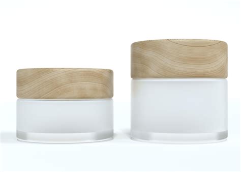 나무 뚜껑이 있는 유리 화장품 크림 항아리 세트 미용 및 관리 제품 포장 및 브랜딩 3d 렌더링 모형 프리미엄 사진