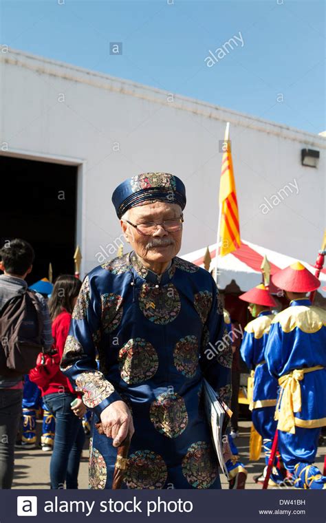 Senior Vietnamese Man In Traditional Costume Celebrating The Tet