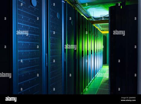 Data Center With Multiple Rows Of Fully Operational Server Racks Stock