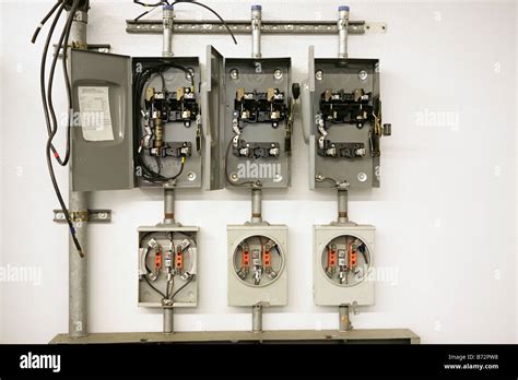Industrial Electrical Meter Center With Multiple Breaker Panels They