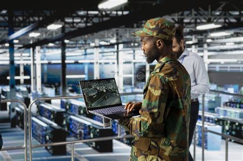 Black Army Technology Specialist Troubleshooting Military Pc Systems