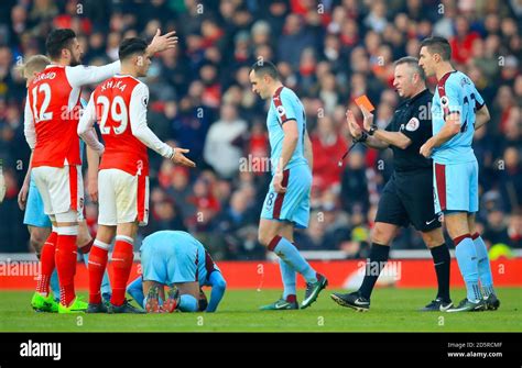 Referee Jonathan Moss Shows Arsenals Granit Xhaka The Red Card For A