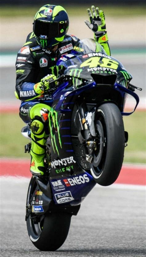 Valentino Rossi Wheelie In Action Wallpaper Background Free Download
