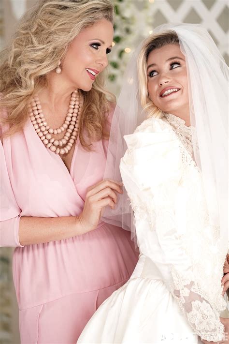 Carolina Sweets Is Affixed With A Garter Before A Lesbian Wedding To