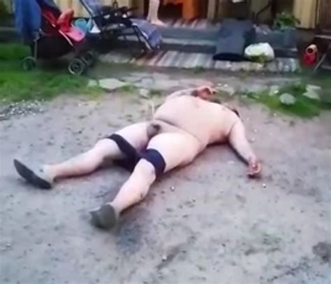 Old Fat Man Pisses And Smokes On His Back