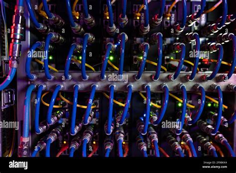 Background Image Of Blue Connected Wires Switched Into Server Equipment