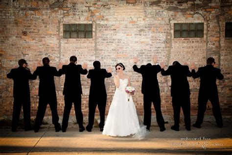 Cheeky Pose Bride With Groomsmen Photography By Edward Fox