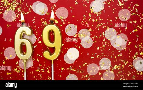 Golden Burning Candle Number Digit Sixty Nine Birthday Greeting Card With Inscription 69 On Red