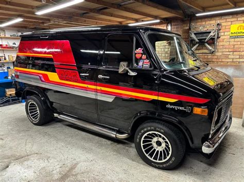 Black Van With Red And Yellow Stripes Classic Van Show Inspiration