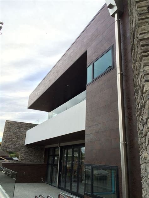 Exterior Cladding Featuring Oxide Moro Exterior Cladding Building