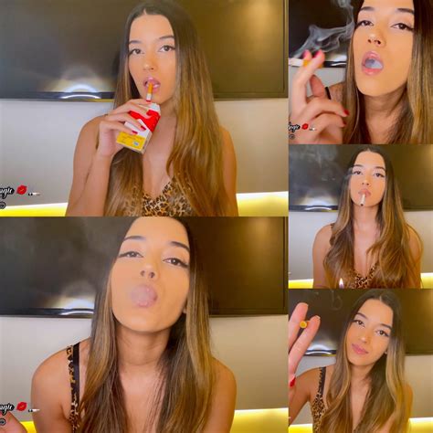 Snaps And Smoke In Your Face Close Up Glossy Lips And A Leopard