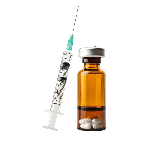 Syringe With Clear Liquid Alongside Amber Medicine Bottle And Pills On