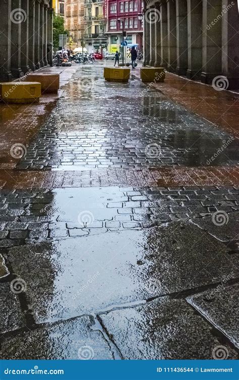 Reflections On A Wet Pavement In Madrid Editorial Stock Image Image