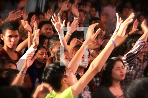 Raised Hands In Praise And Worship To God — Photo — Lightstock