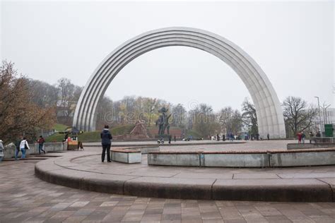 City Kiev Ukraine Iron Arch And Monument Tourists Walk Around