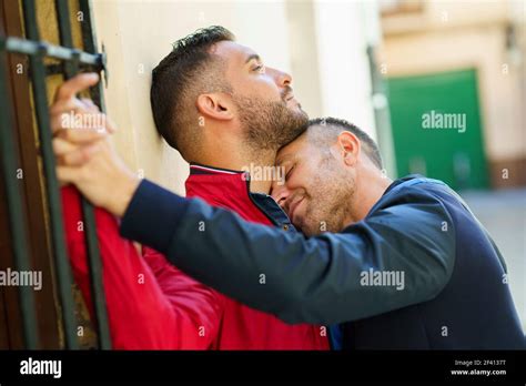 Gay Couple In A Romantic Moment In A Beautiful Place Near The River