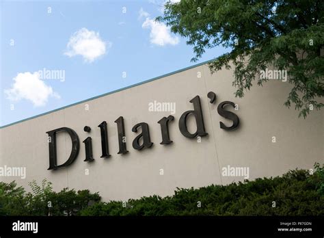 A Logo Sign Outside Of A Dillards Retail Store Location In Omaha