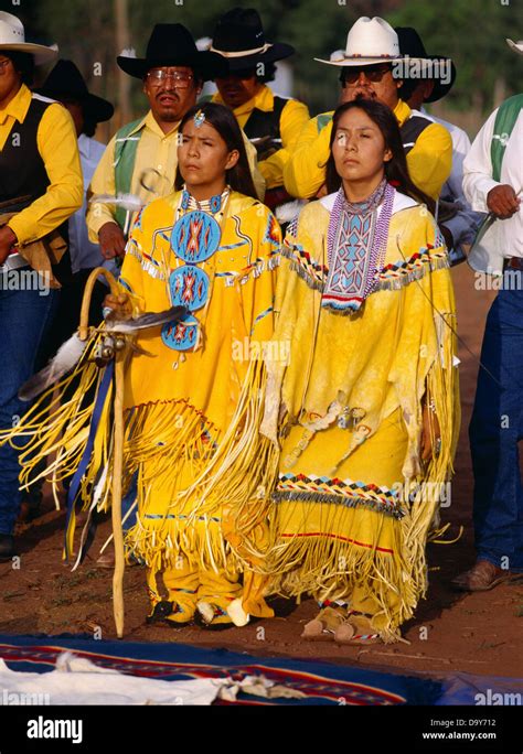 Usa Arizona Whiteriver People Facing Sunrise With Burnette Singers
