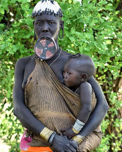 African Tribal Women Giving Birth