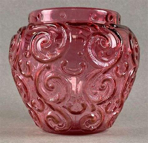 antique cranberry pressed glass jar with scrolling design matthew