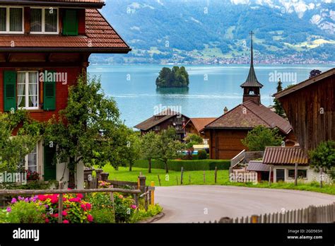 The Traditional Swiss Village Of Iseltwald On The Famous Lake Brienz