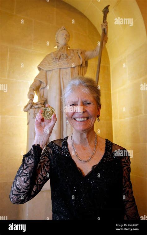 U S Molecular Biologist Joan Argetsinger Steitz Poses With Her Great Medal Of The French