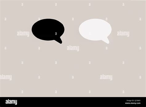Blank White And Black Speech Bubbles With Copy Space On A Gray