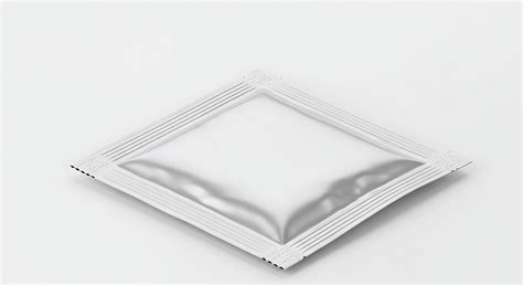 A White Square Packet Of Medicine On A White Surface 66071555 Stock